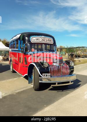 old red Chevrolet 1946 bus, public passenger transport in Buenos Aires ...