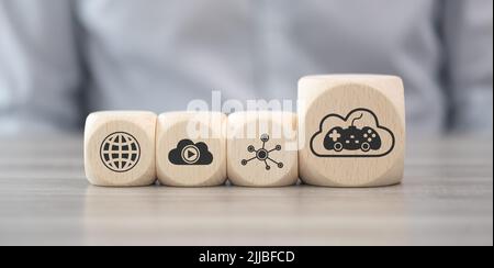 Wooden blocks with symbol of cloud gaming concept Stock Photo - Alamy