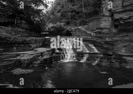 A grayscale shot of Lucifer Falls waterfall in New York State Stock ...