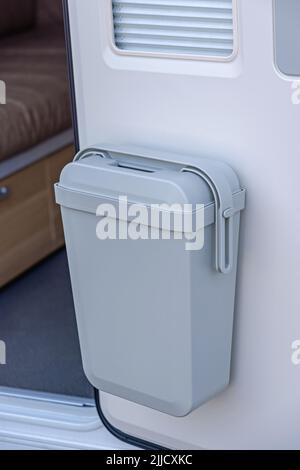 Door Mounted Trash Can With Lid Camper Van Stock Photo - Alamy
