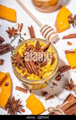 Pumpkin pie oatmeal with yogurt and pecan nuts, healthy autumn ...