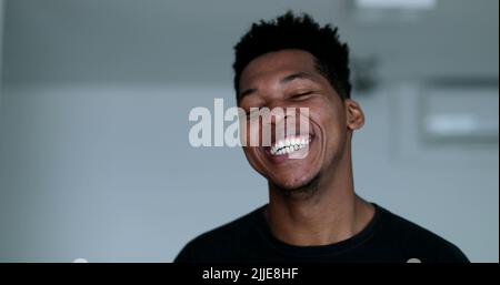 Spontaneous black man burst laughing out loud. African person authentic ...