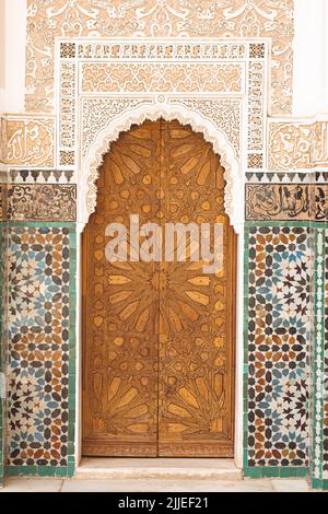 Old Arabian style gate entrance with a wooden arch window in Marrakesh ...
