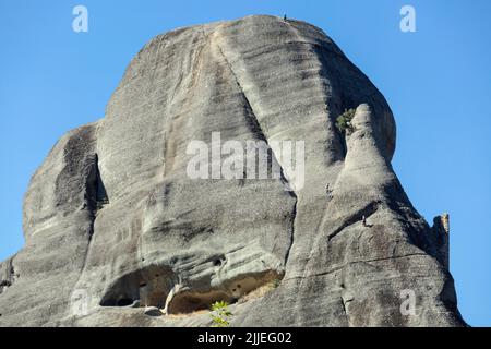 Rock climbers on the huge rock pillars formation of Meteora, Kalabaka ...