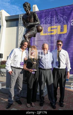 July 25, 2022: Jackie Maravich poses with the new statue with her son's ...