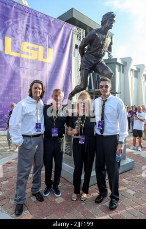 July 25, 2022: Jackie Maravich poses with a small statue with her son's ...