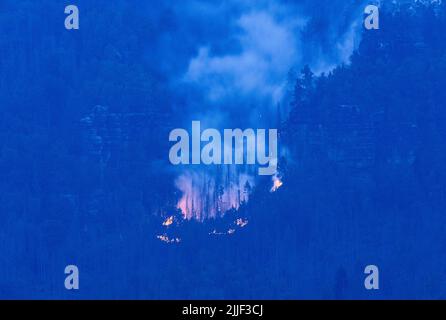 Schmilka, Germany. 26th July, 2022. The forest is on fire in the Saxon ...