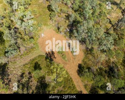 Aerial view of dirt road and roundabout in winter on sunny day Stock ...