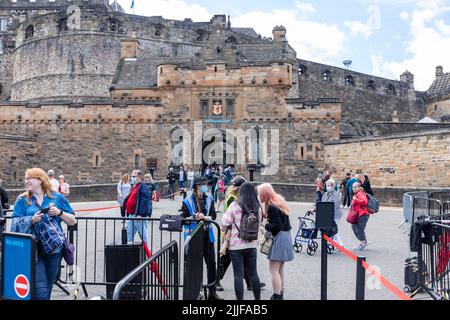 Edinburgh Castle Scotland, visitors to the castle pass past the ticket ...
