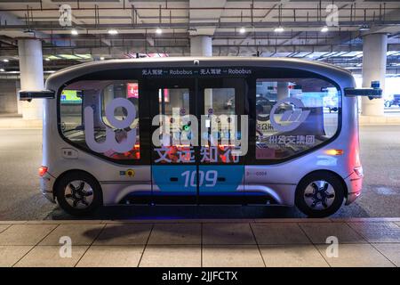 GUANGZHOU, GUANGDONG PROVINCE, CHINA - Buses and autos on road under ...
