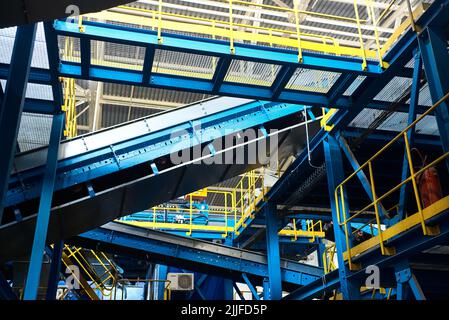 System of conveyors carrying trash at waste processing plant Stock Photo - Alamy