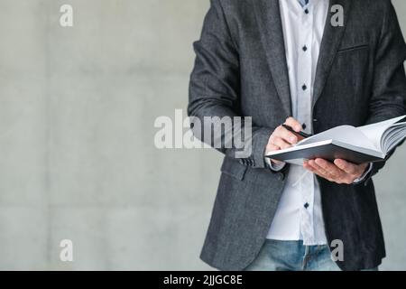 man hold planner. copy space. agenda. businessman hold notebook. ceo ...