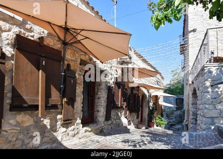 A narrow street in Pesche, a mountain village in the Molise region of ...