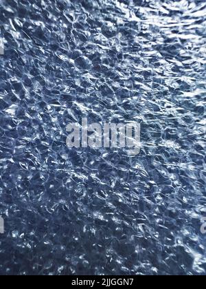 Macro close-up of many soap bubbles in the water as a background Stock ...