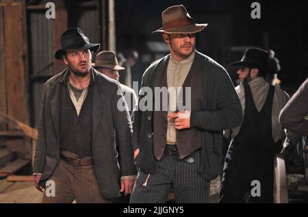 Still of Tom Hardy and Jason Clarke in Lawless Stock Photo - Alamy