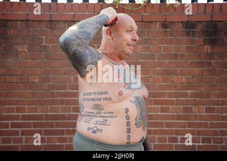 A Nottingham Forest fan with tattoos poses for a picture before a pre ...
