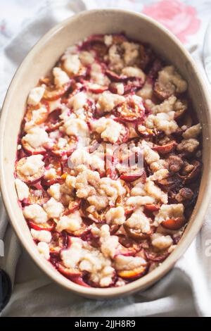 Crust homemade pie with purple plums Stock Photo - Alamy