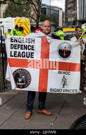 A man holding a flag during the EDL march through Newcastle city Stock ...