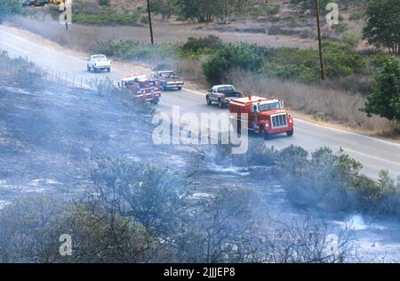 San Diego Fire Department Water Tender 28 arriving at a brush fire with ...
