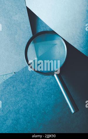 magnifying glass comparison assessment analysis Stock Photo - Alamy