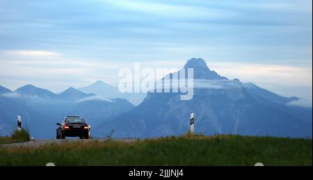 Seeg, Germany. 27th July, 2022. Grasses stand on a meadow under partly ...