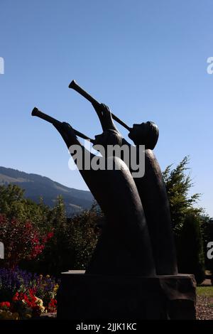 statue with trumpet player. enjoy their trumpets during summer with ...