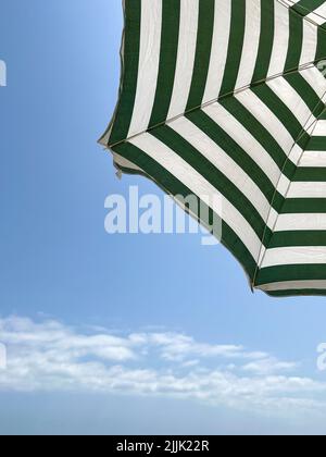Beach umbrella close up against a sea landscape Stock Photo - Alamy