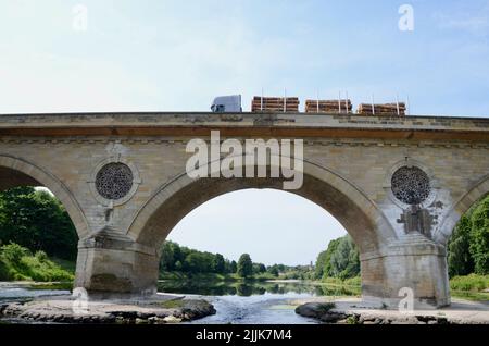 historic coldstream bridge on river tweed on england and scotland ...