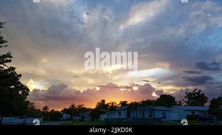 A residential area under a cloudy sunset sky in Miami, USA Stock Photo ...