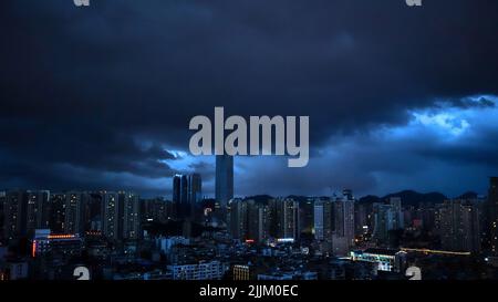 GUIYANG, CHINA - JULY 27, 2022 - A thunderstorm over the city before ...