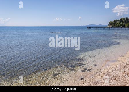 Ionian Sea beach in Anemomylos area of Corfu city on the island of ...