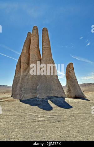 Hand sculpture in the Atacama desert in Northern Chile Stock Photo - Alamy
