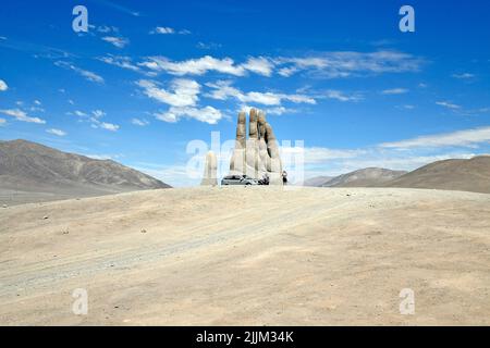 Hand sculpture in the Atacama desert in Northern Chile Stock Photo - Alamy