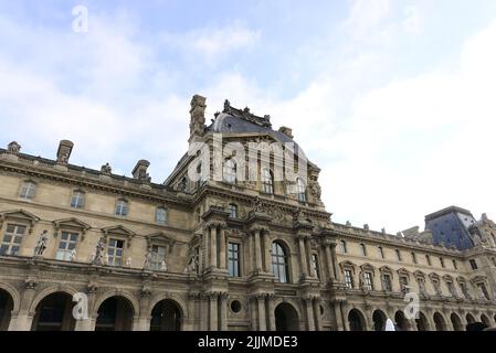 Low angle shot of the Louvre Museum in Paris, France Stock Photo - Alamy