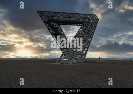A beautiful view of the Saar Polygon steel structure under the cloudy ...