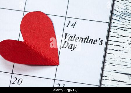 Calendar page with red heart on February 14 th of Saint Valentines day ...