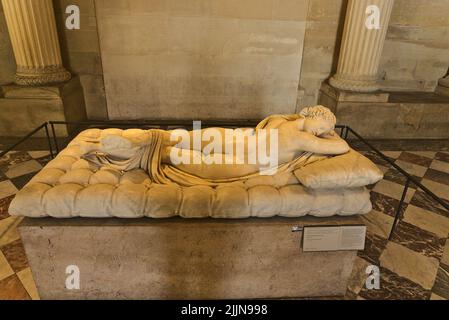 The historic sculpture of Hermaphroditus at the Louvre Museum in Paris ...