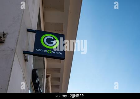Logo View of GRAND OPTICAL optician Brand on Front of french Store ...
