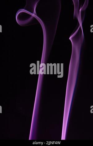 Real colorful smoke on black background Stock Photo - Alamy
