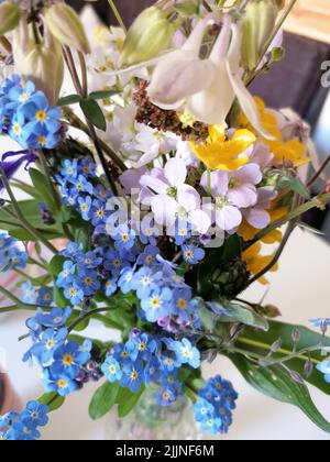 a colorful bouquet of bright spring flowers of various types, close-up ...