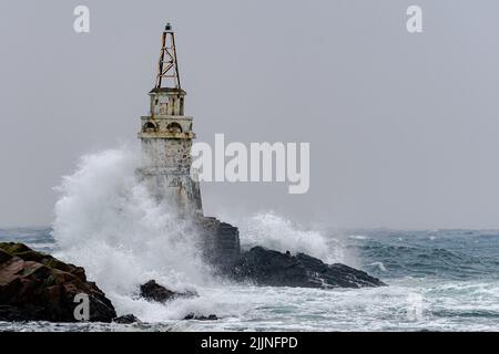 A big storm near an old lighthouse in Achtopol bay, Black sea, Bulgaria ...