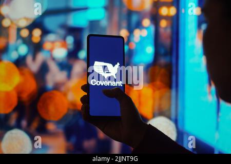 In this photo illustration, the Covenant Logistics Group logo is ...