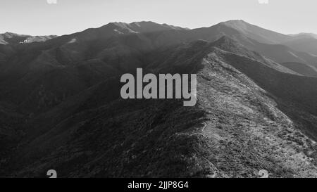 A grayscale shot of snowy alps Stock Photo - Alamy