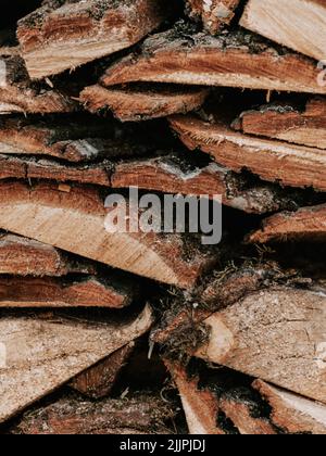 A vertical shot of firewood stack Stock Photo - Alamy