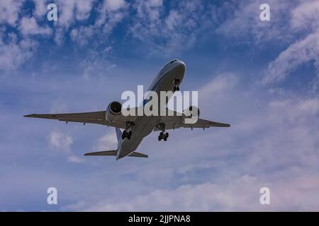 A Commercial Airliners aircraft airplane approaching landing at YVR ...