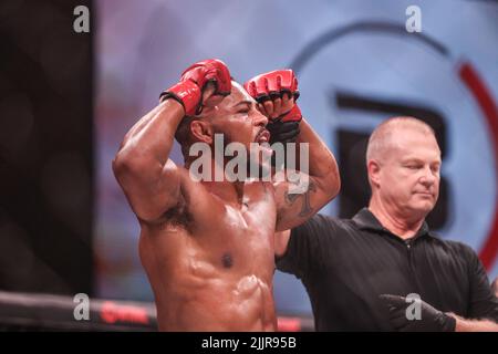 Archie Colgan reacts to having his hand raised after defeating Bryan ...
