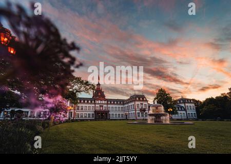The Schloss Philippsruhe castle at sunset in Hanau, Germany Stock Photo ...