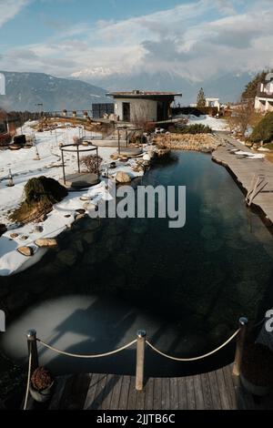 A vertical shot of the Dolomites mountains covered in snow, Italy Stock ...