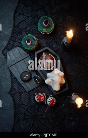 Macarons and muffins decorated for monsters, skeleton, ghost and witch ...
