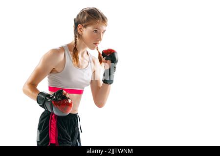 Portrait of sportive girl, junior MMA fighter in sports uniform ...